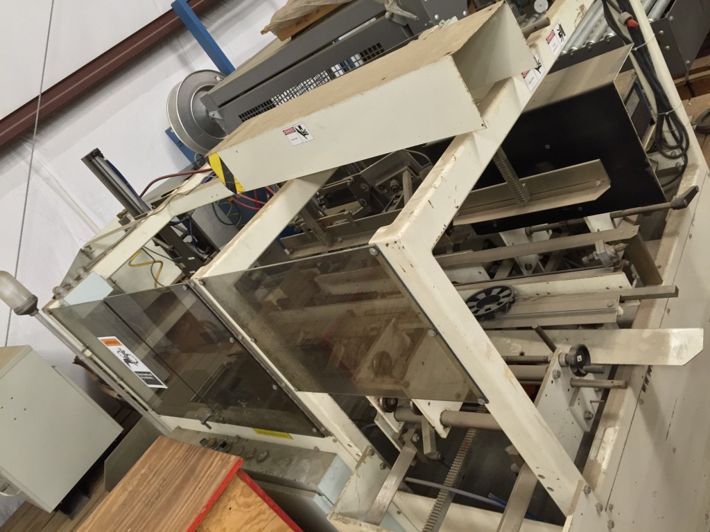 Casepackers | Packaging Equipment Inc